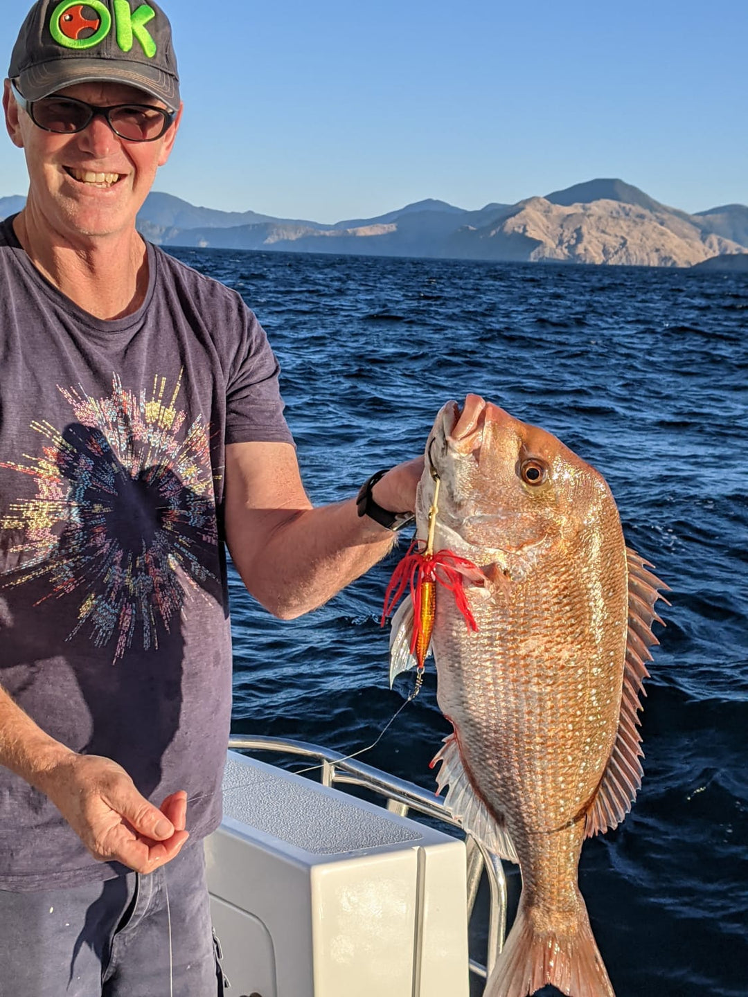 Greg with a lovely fat snapper on a squidward lure – OK.fish